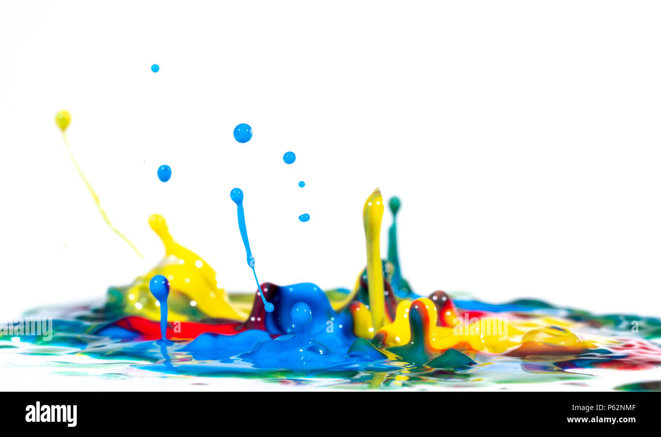 Splash of color ink on white background Stock Photo - Alamy