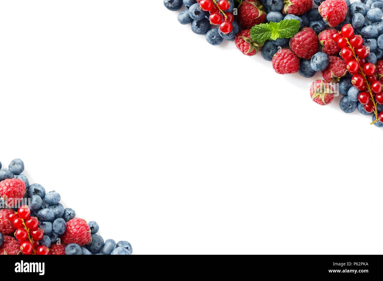 Mix berries and fruits on a white. Berries and fruits at border of ...