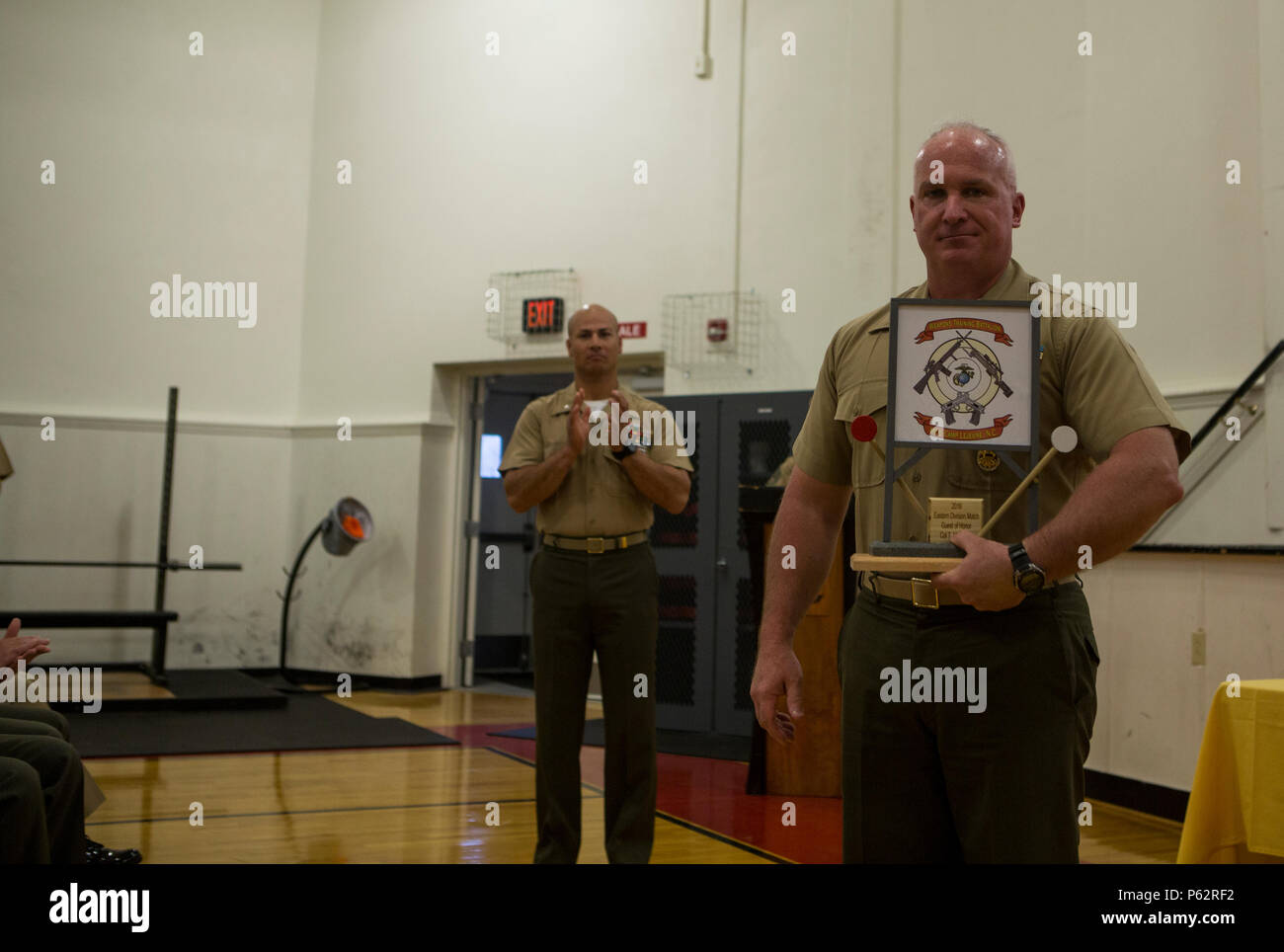 U.S. Marine Corps Col. Timothy M. Parker, right, operations officer ...