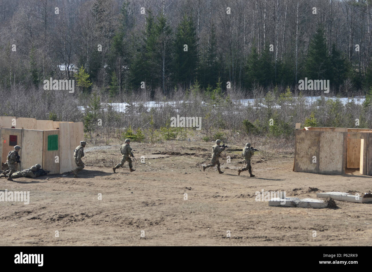U.S. Army Iron Troop's second assault team approaches the objective ...