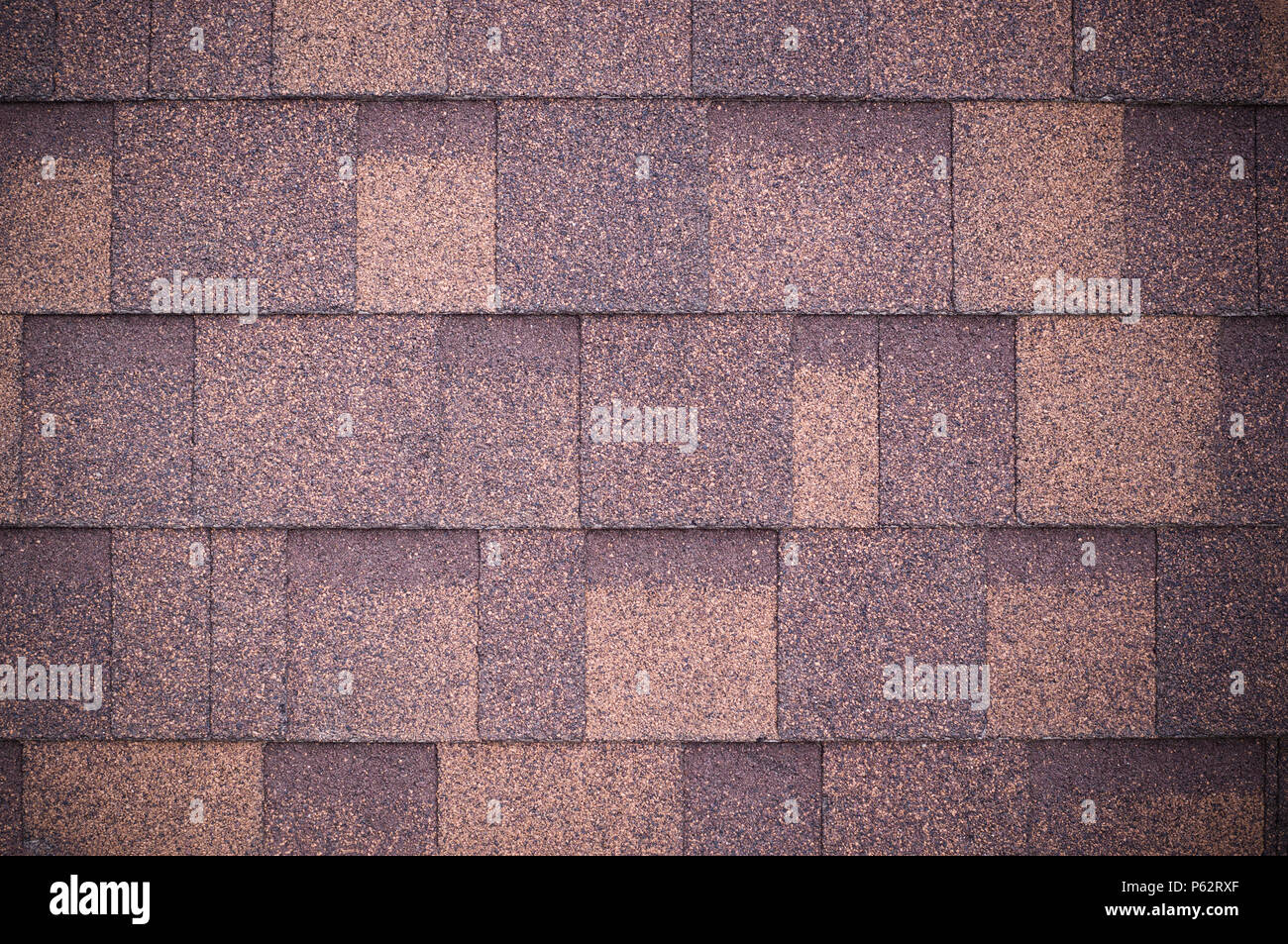 roof of new brown shingles background and texture. vignette Stock Photo ...