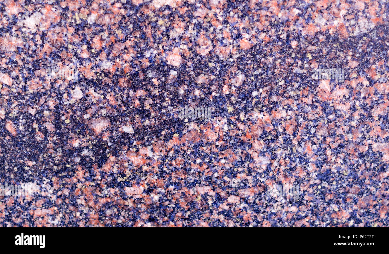 granite texture with gray base and black spots. background, geological ...