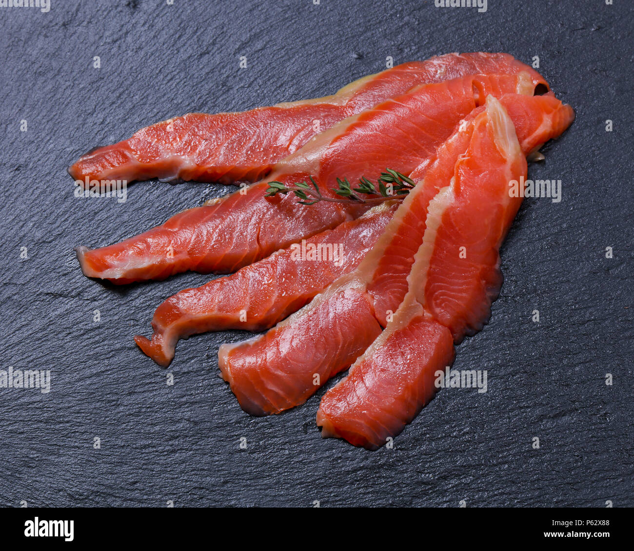Raw trout fillet with salt and spices Stock Photo - Alamy
