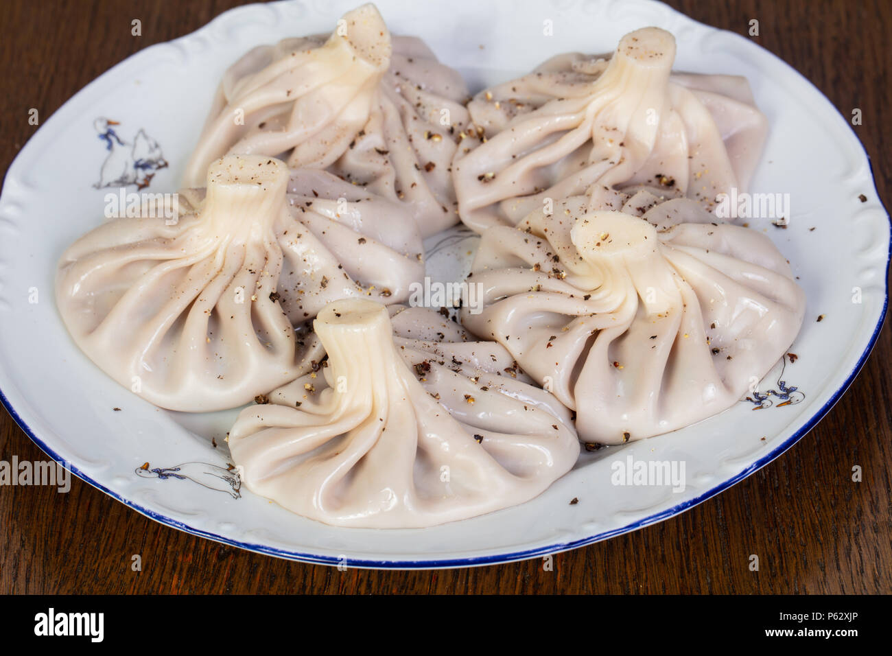 Georgian traditional Khinkali dumplings Stock Photo - Alamy