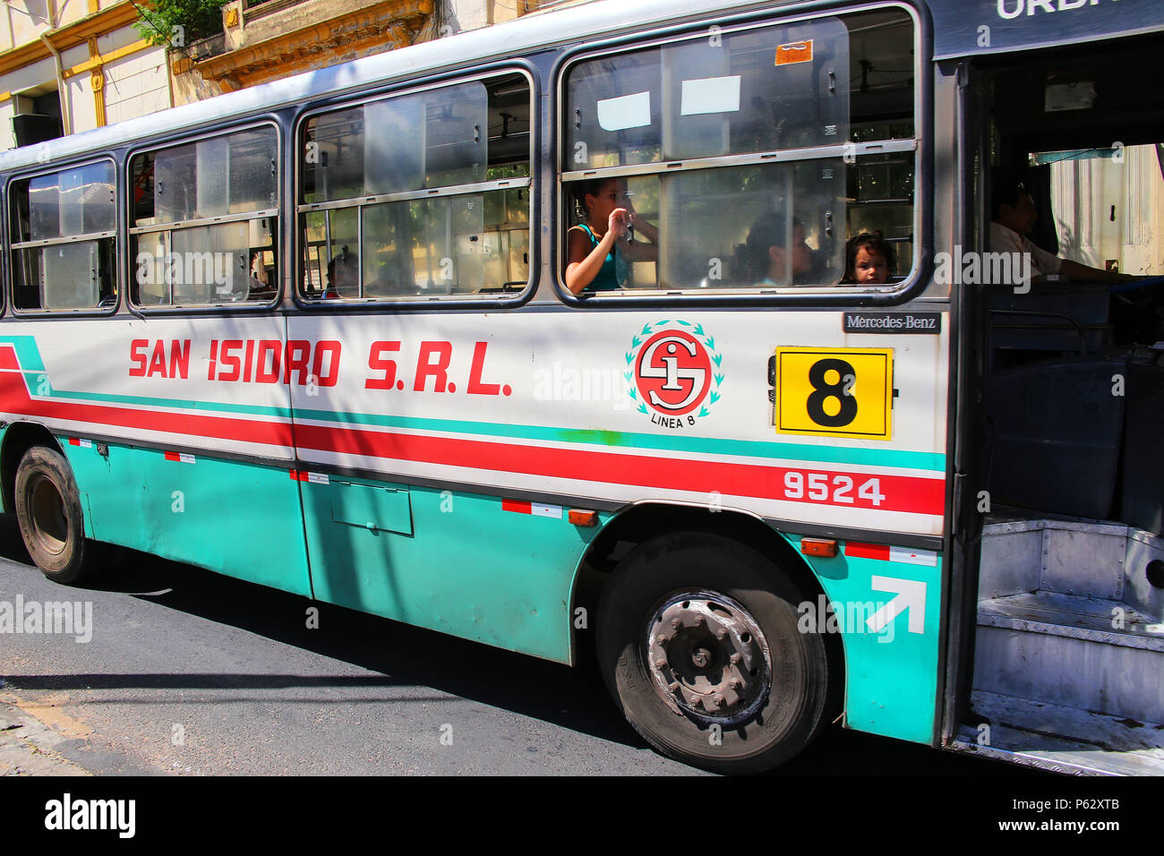 Close-up of a public bus in Asuncion, Paraguay. Asuncion is the capital and the largest city of ...