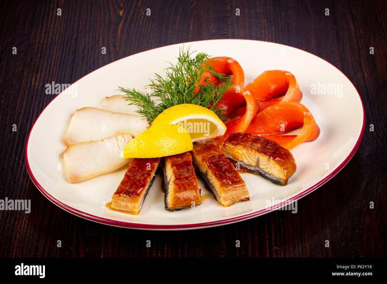 Fish plate with eel and salmon Stock Photo - Alamy