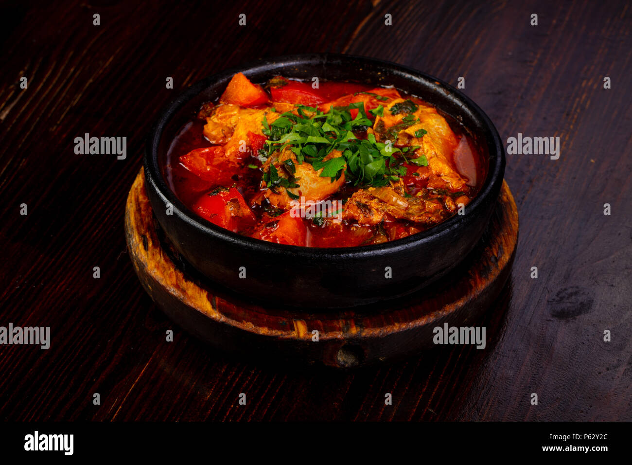 Georgian cuisine Chahohbili with chicken Stock Photo - Alamy