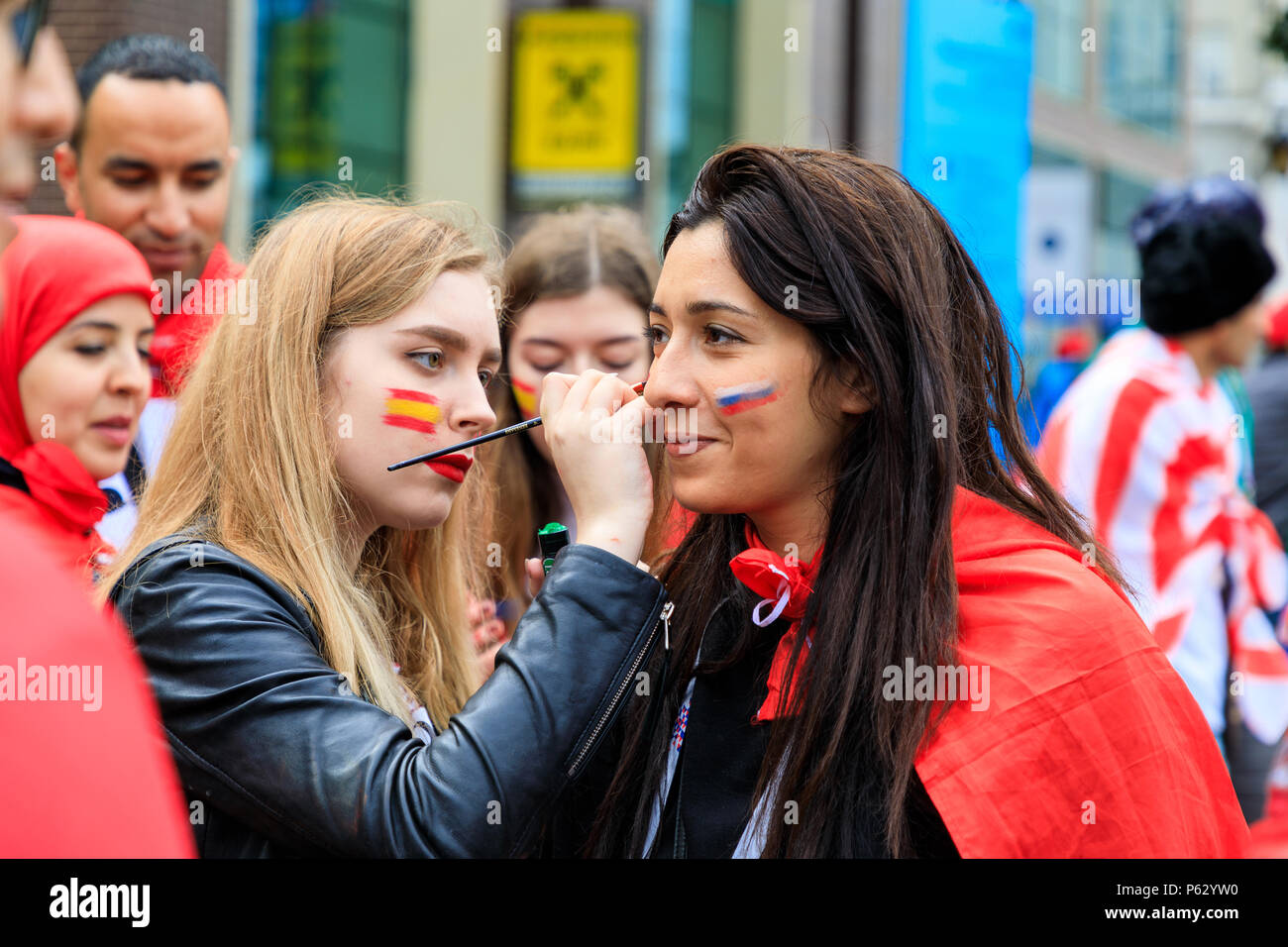 Kaliningrad, Russia - June 25 2018: Woman is drawing a national flag of ...
