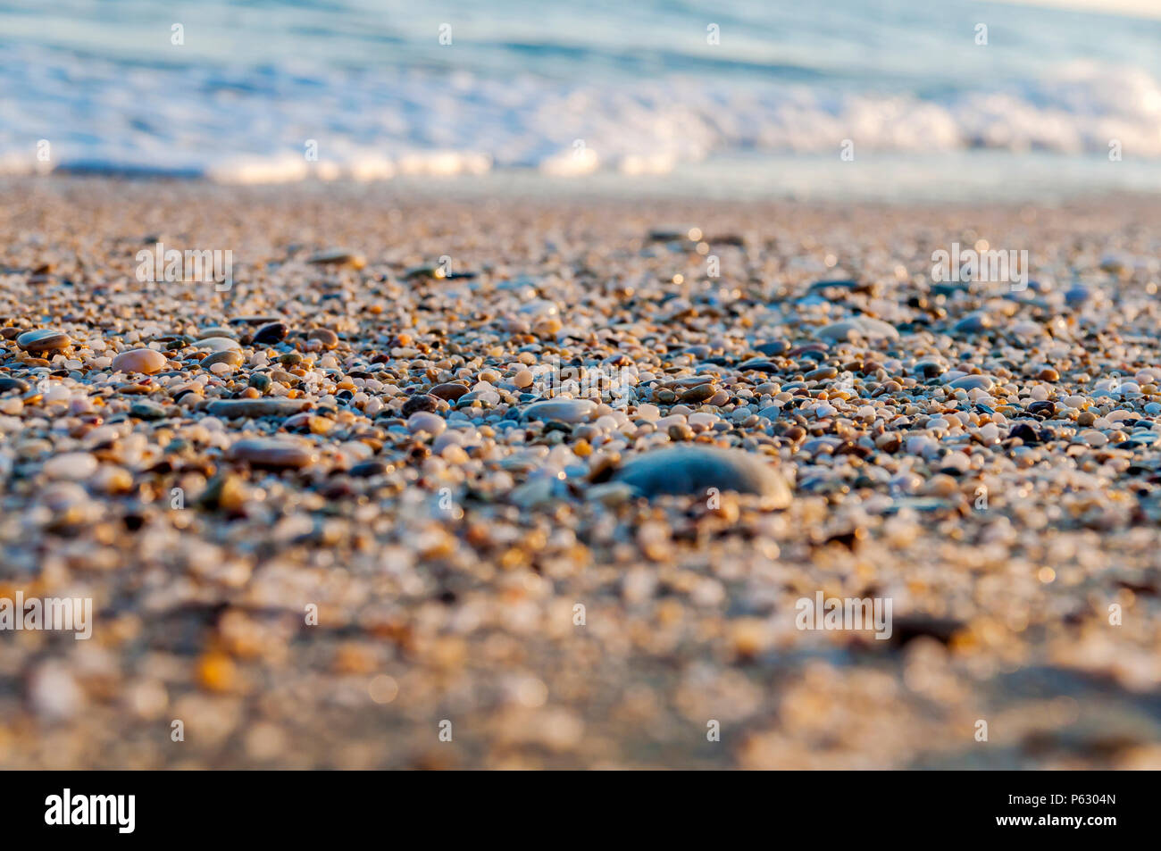 Naturally rounded gravel at sea shore, nature sea background texture ...