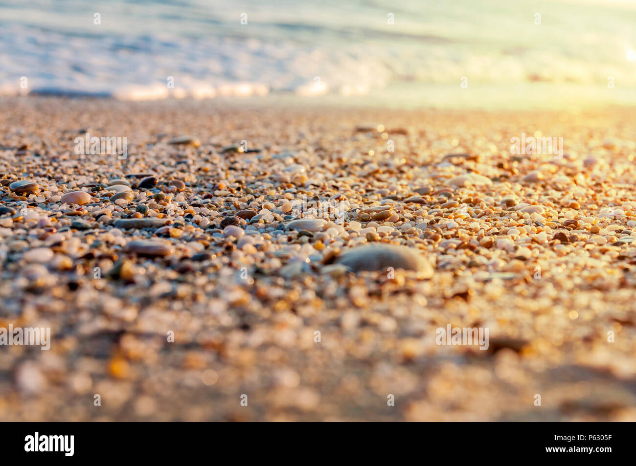Naturally rounded gravel at sea shore, nature sea background texture ...
