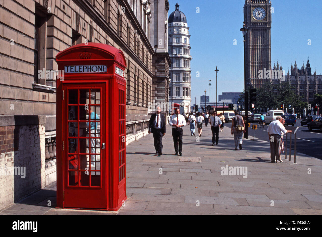 Traditional red telephone box with Big Ben beyond, 1991 Stock Photo - Alamy