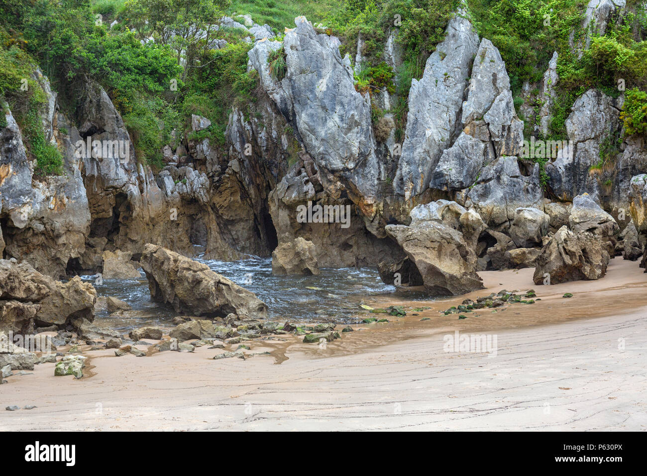 the famous beach gulpiyuri, in Asturias, Spain Stock Photo - Alamy