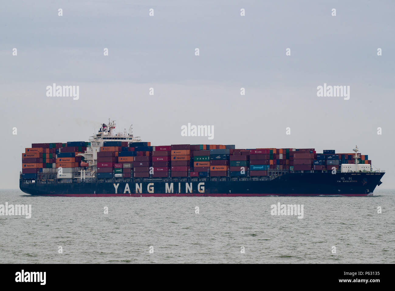 Yang ming, A large shipping container in theThames shipping lanes ...