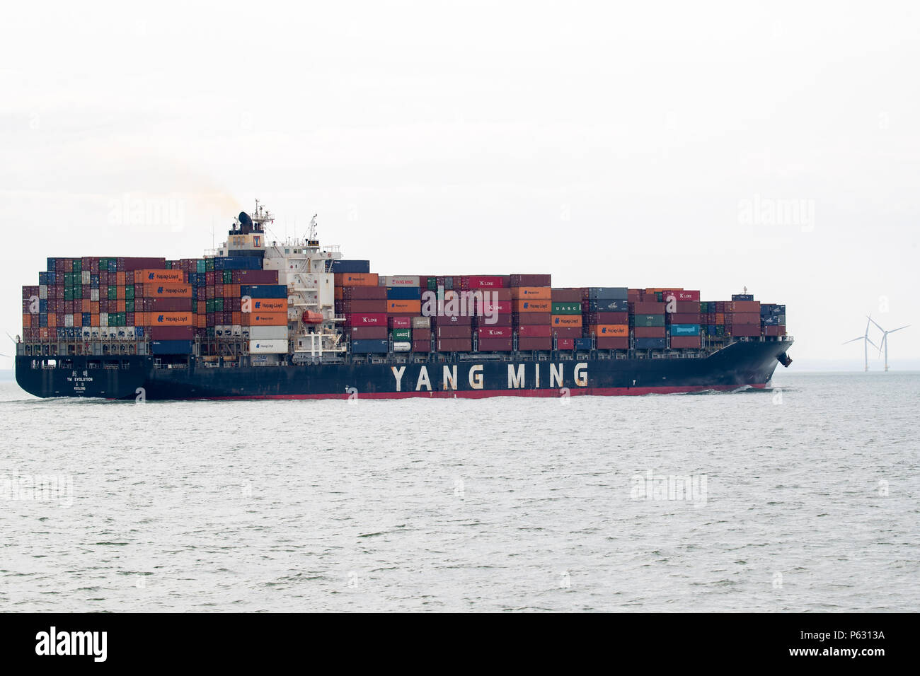 Yang ming, A large shipping container in theThames shipping lanes ...