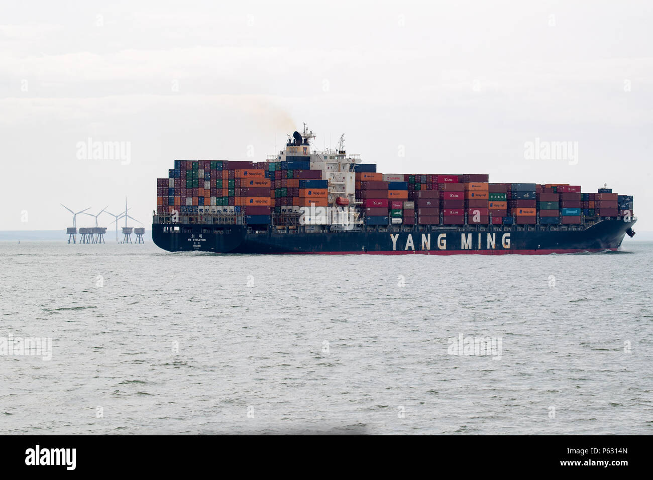 Yang ming, A large shipping container in theThames shipping lanes ...