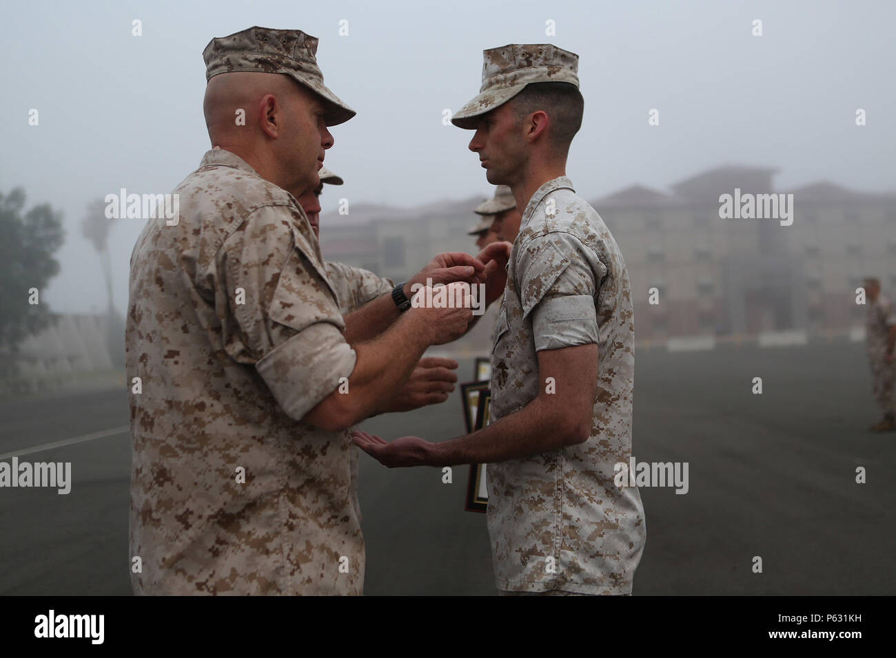 U.S. Marine Lt. Gen. David H. Berger and Sgt. Maj. Bradley A. Kasal ...