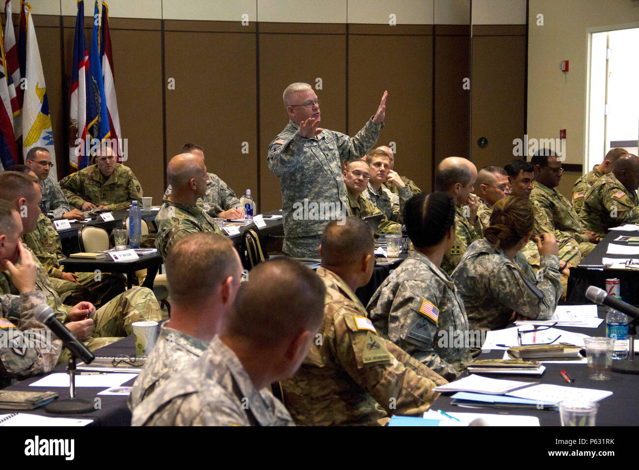 Col. Thomas Bright, chief of operations, Army National Guard, asks a ...