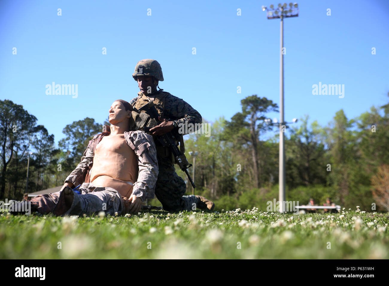 A scout with 2nd Light Armored Reconnaissance Battalion demonstrates ...
