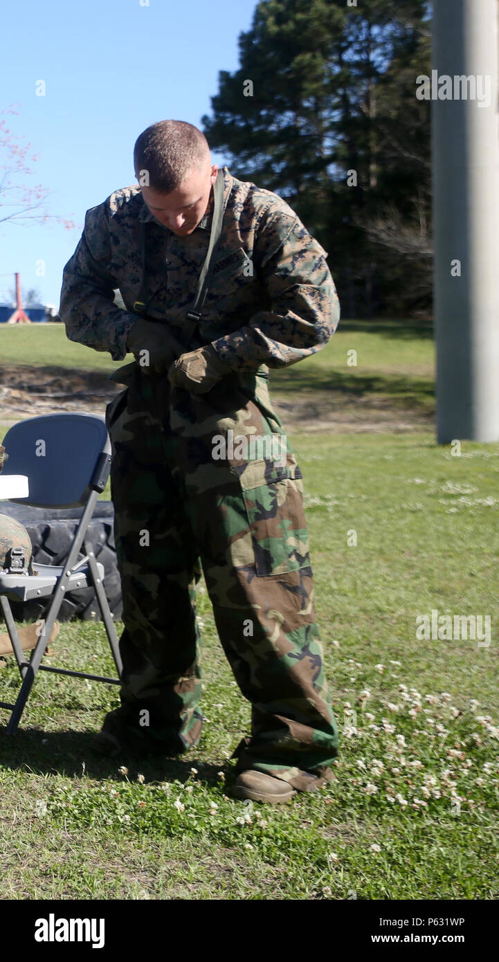 A scout with 2nd Light Armored Reconnaissance Battalion demonstrates ...