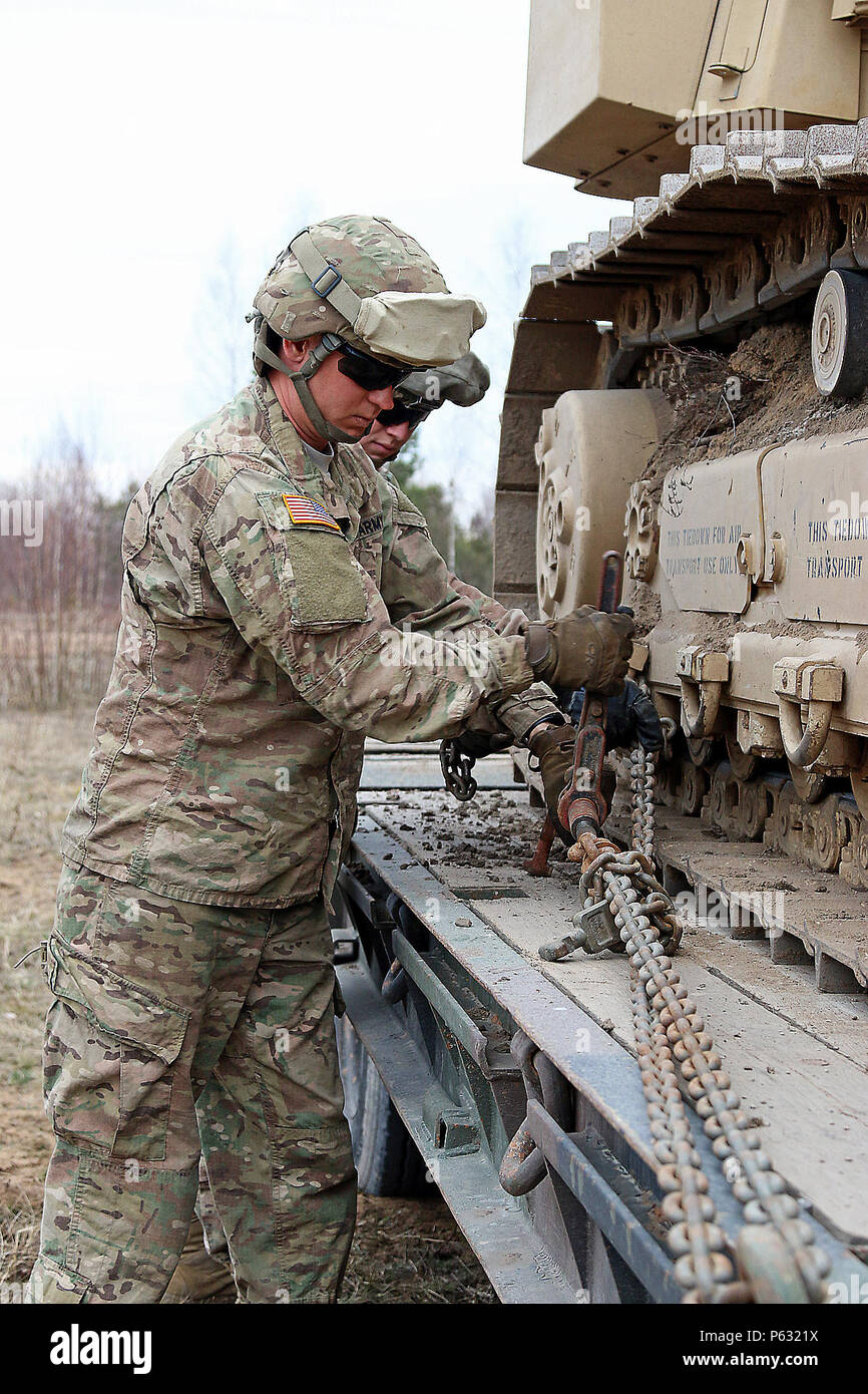 Spc. Jonathan Renfro (front), and Sgt. Zachary Chandler, both bridge ...