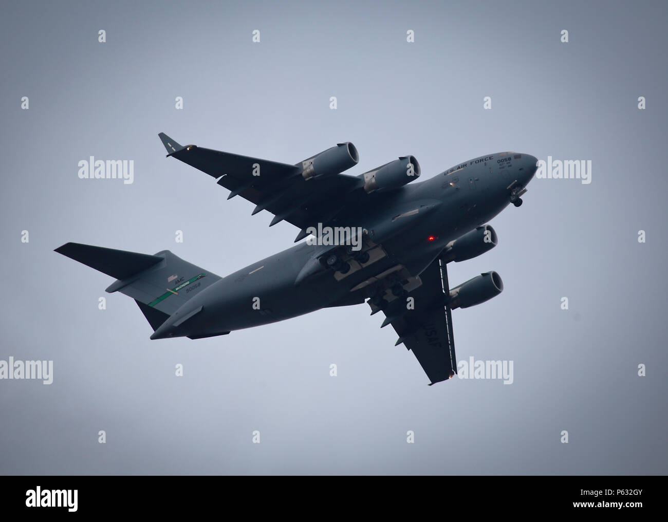 A U.S. Air Force C-17 Globemaster III from the 62nd Airlift Wing flies ...