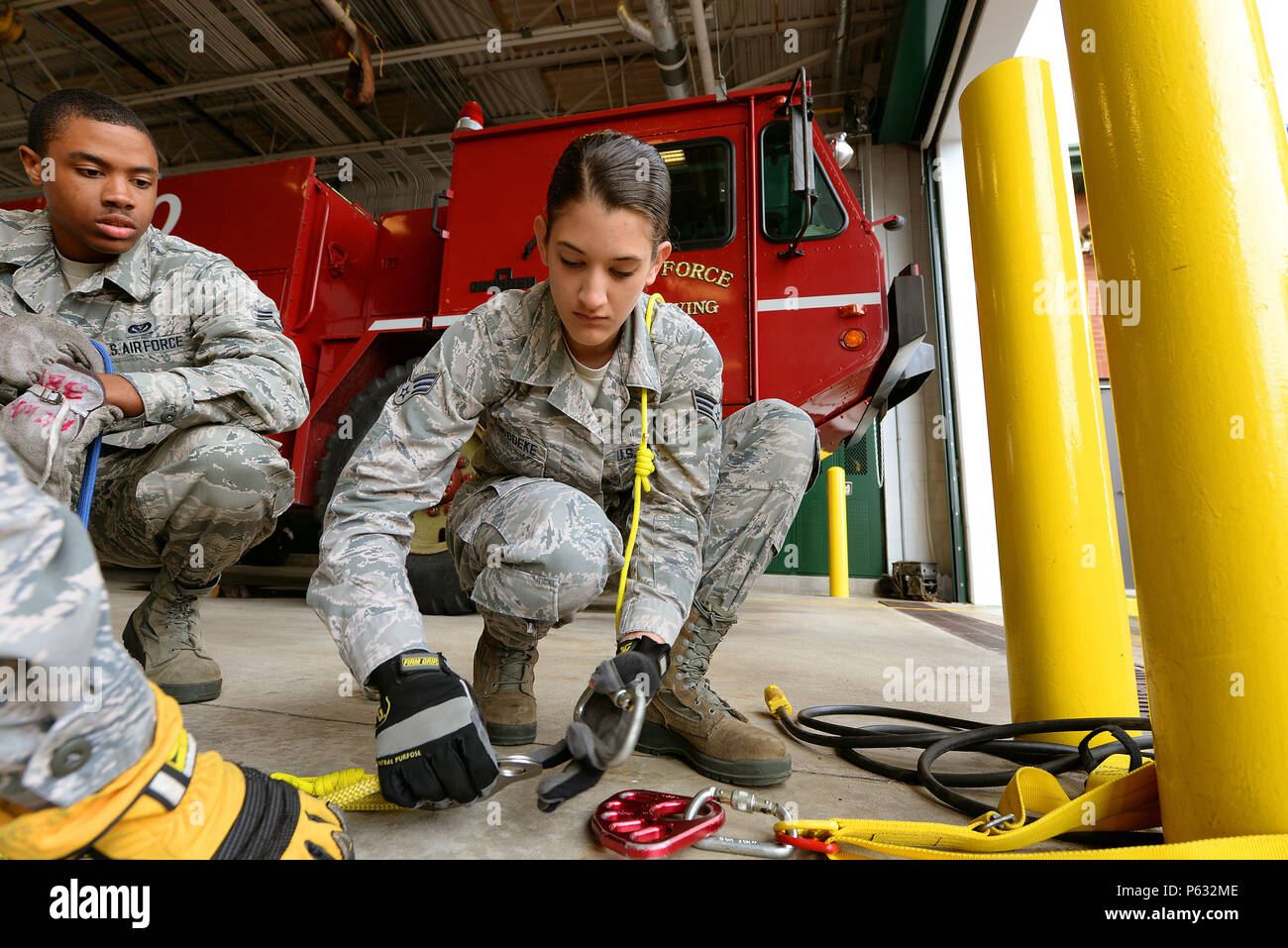 Senior Airman Amber Lueddeke of the 177th Fighter Wing Fire Department ...