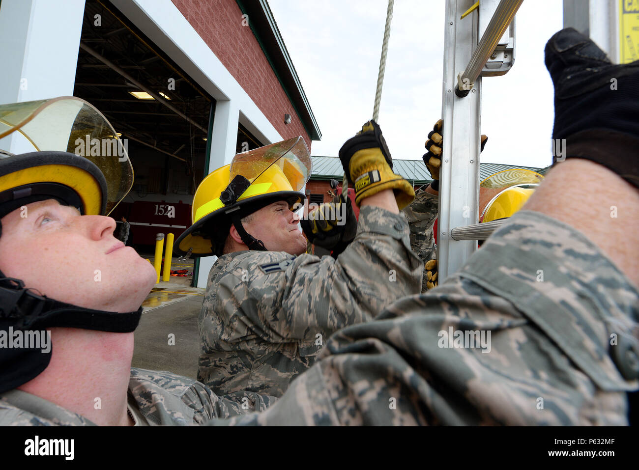 Airman 1st Class Adam Osmola (Center) and Senior Airman Brian Collison ...