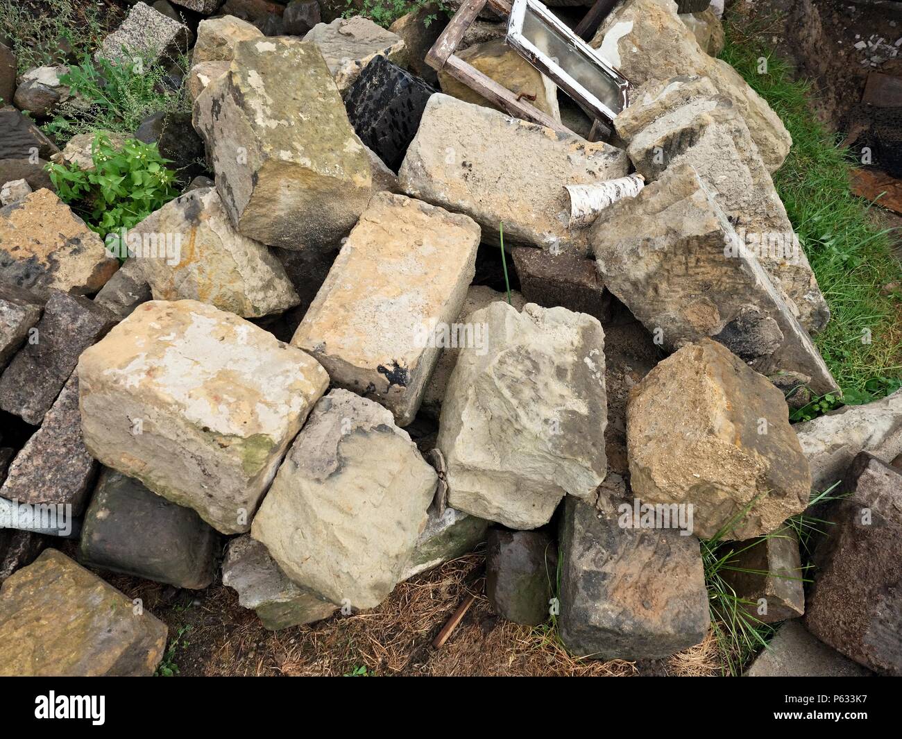 Old sandstone blocks. Heap of historical soft sand stones prepare for ...