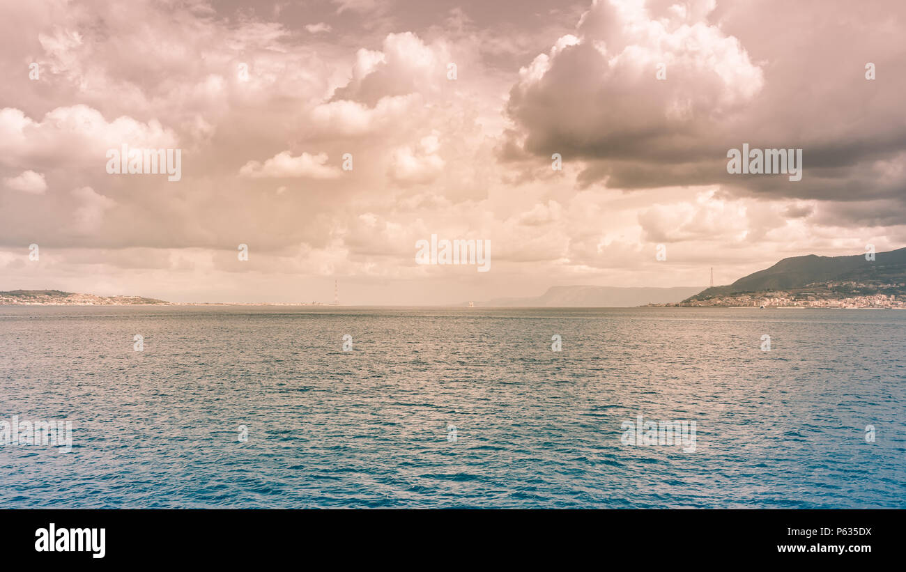 Panoramic view of the Strait of Messina which divides Sicily from Italy ...