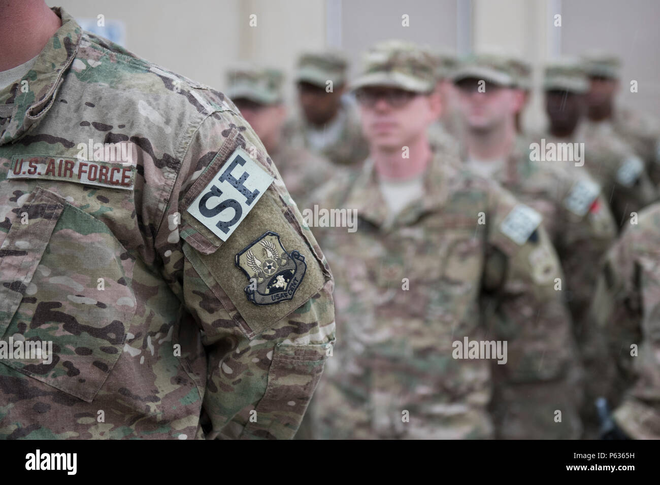 Members of the 455th Expeditionary Security Forces Squadron stand in ...