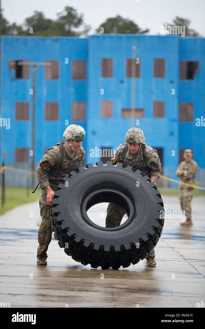 U.S. Army Staff Sgt. Joshua Rolfes and 1st Sgt. David Floutier ...