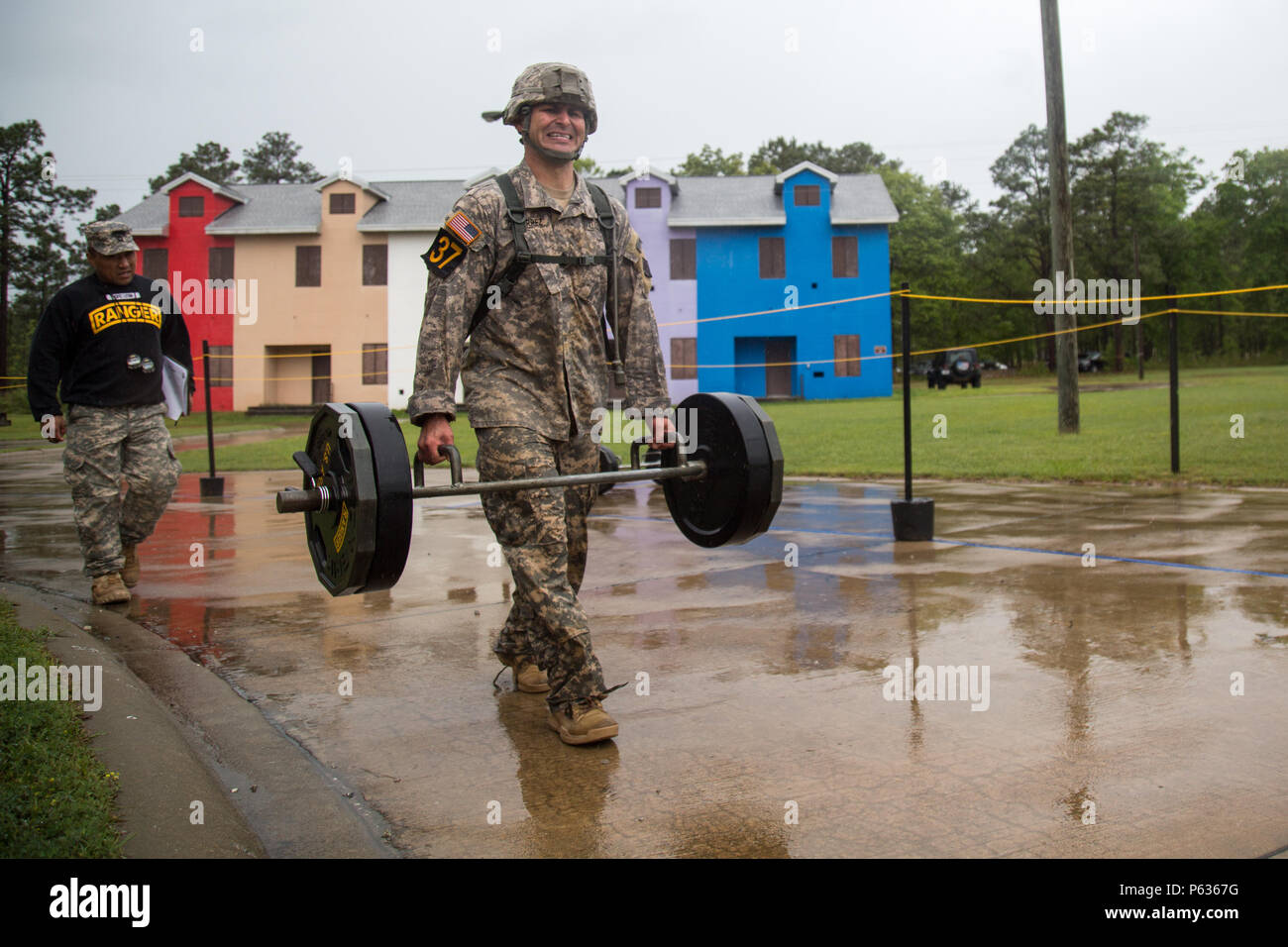U.S. Army 1st Sgt. Ricardo Gutierrez, assigned to Fort Jackson, carries ...