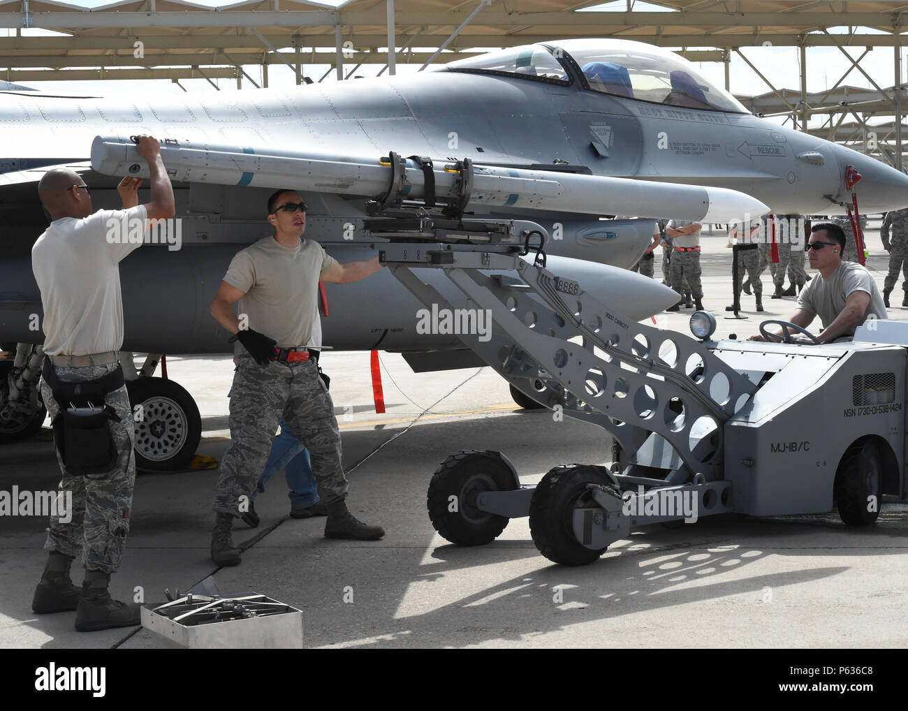 Tech. Sgt. Mark Nash (left), Tech. Sgt. Federico Barrios (center) and ...