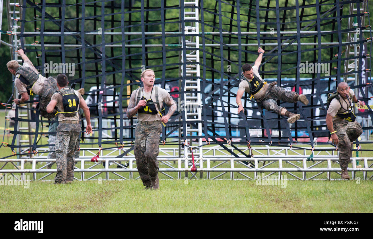 U.S. Army Soldiers work to complete the A-frame Cargo obstacle as part ...