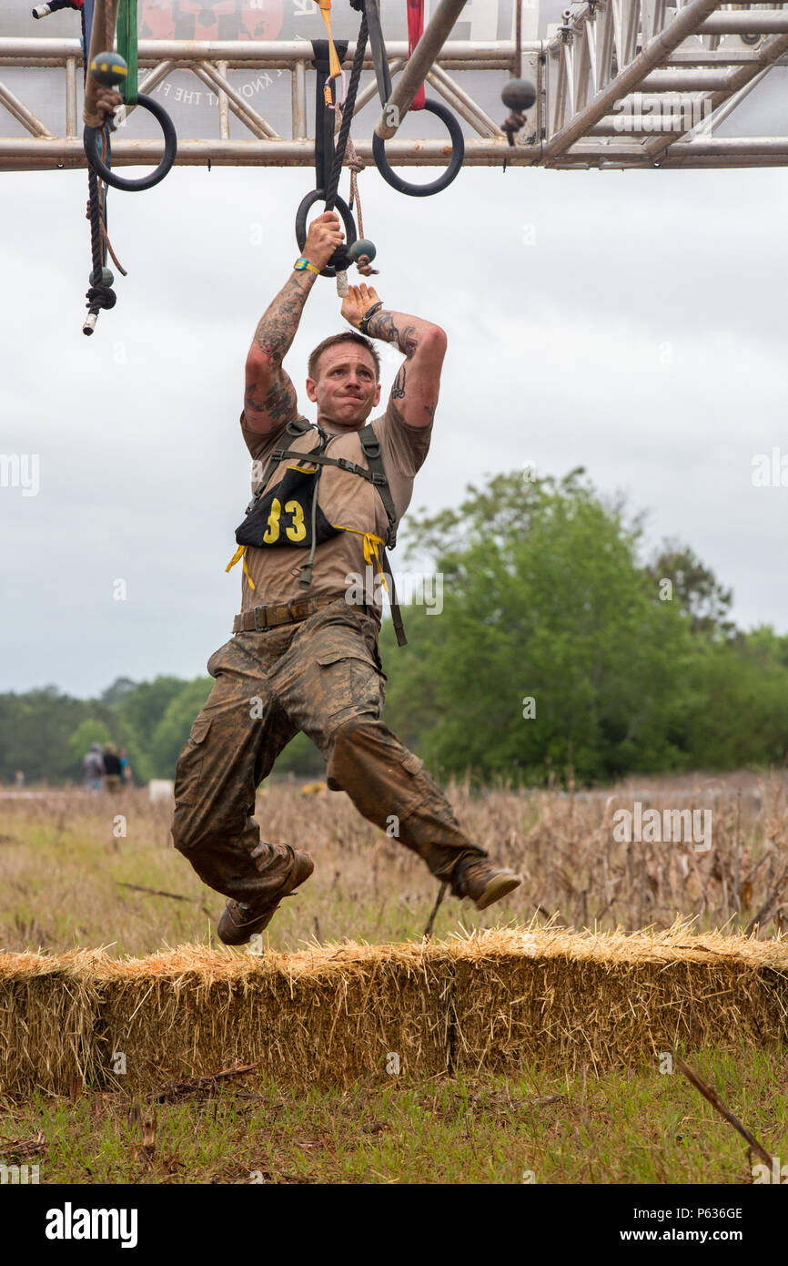 U.S. Army Staff Sgt. Joshua Rolfes, assigned to the Airborne and Ranger ...