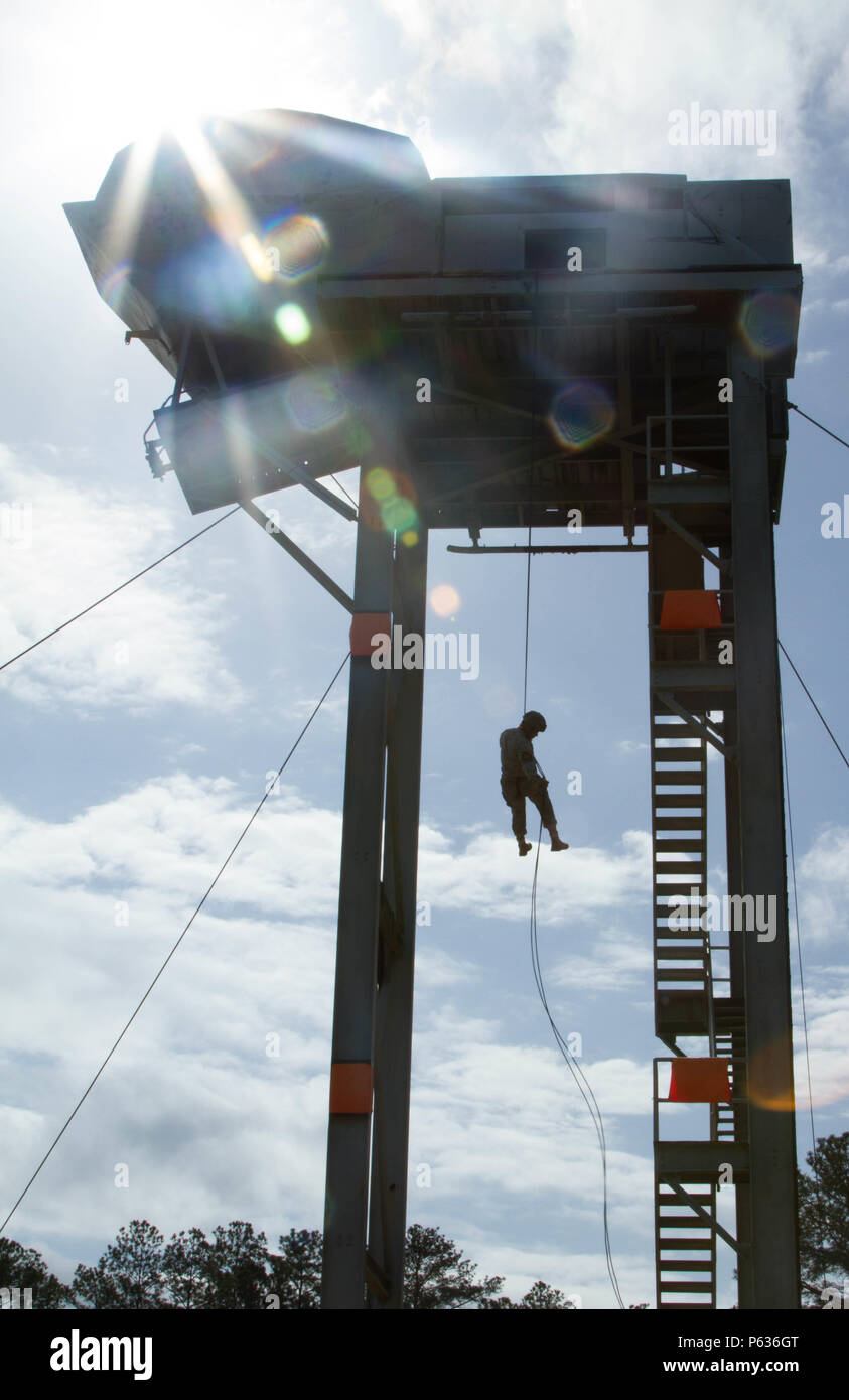 A U.S. Army Ranger rappels from a tower during the Best Ranger ...