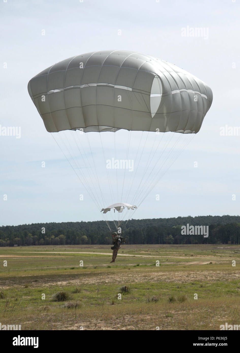 A Paratrooper with the 82nd Airborne Division performs a static line ...