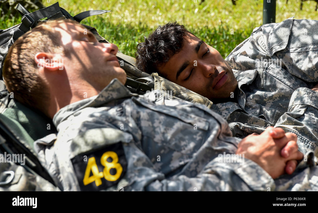 U.S. Army Sgt. 1st Class Troy Conrad (left) and Capt. Jose Moreno ...