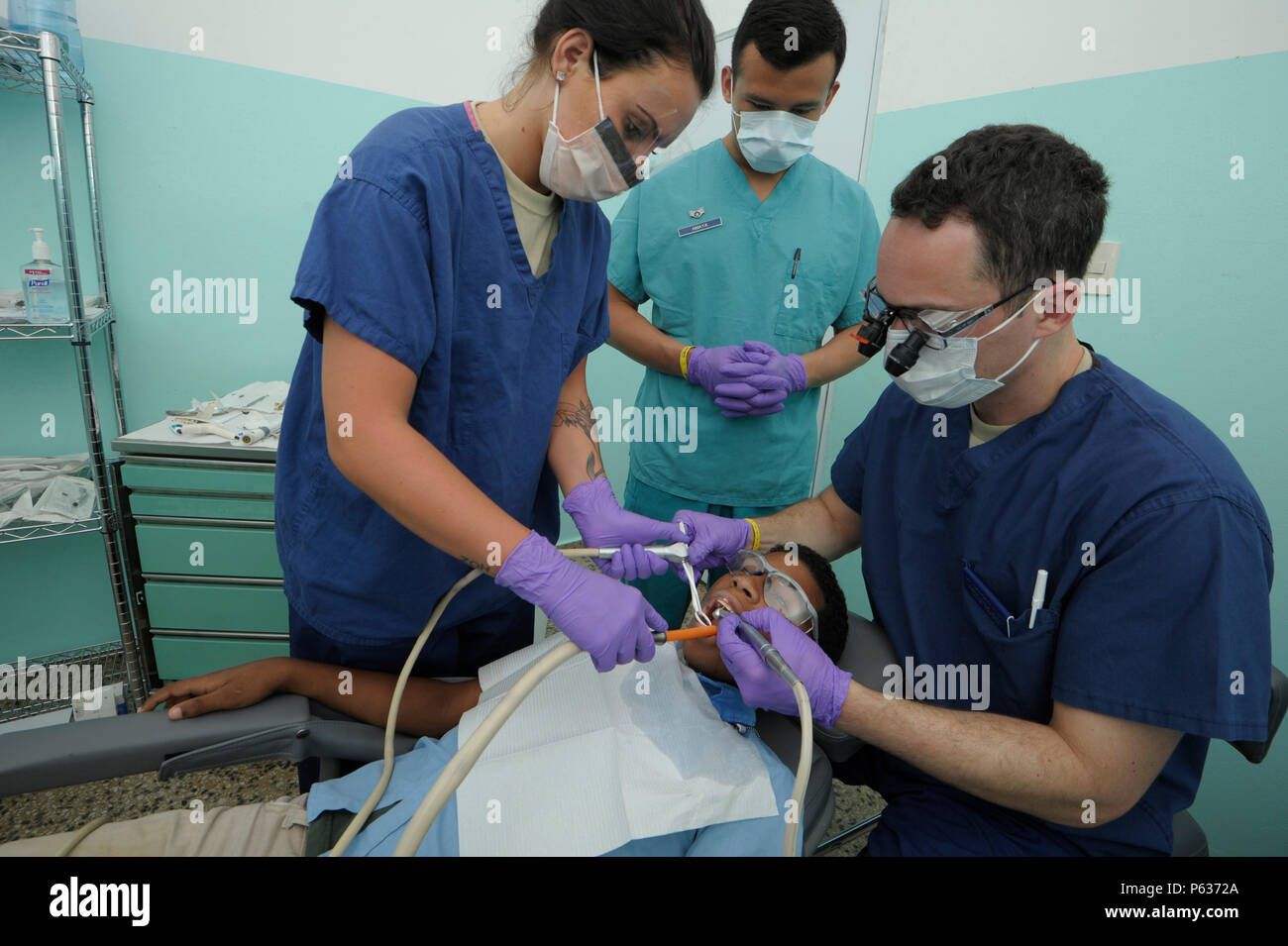 (l-r) Senior Airmen Victoria Perrone, Jose Amaya, and Capt. Christopher ...