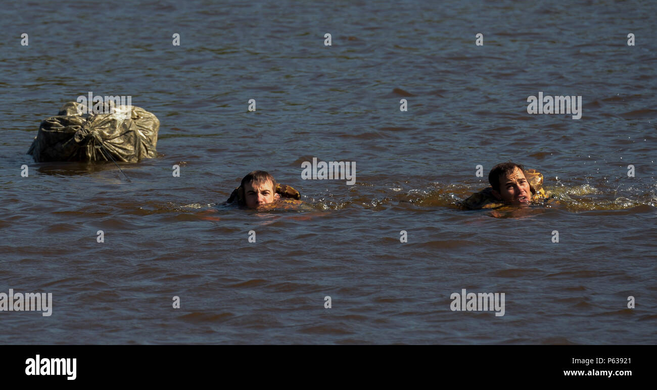 U.S. Army Sgt. 1st Class Keith Batchelder (left) and Capt. Bert ...