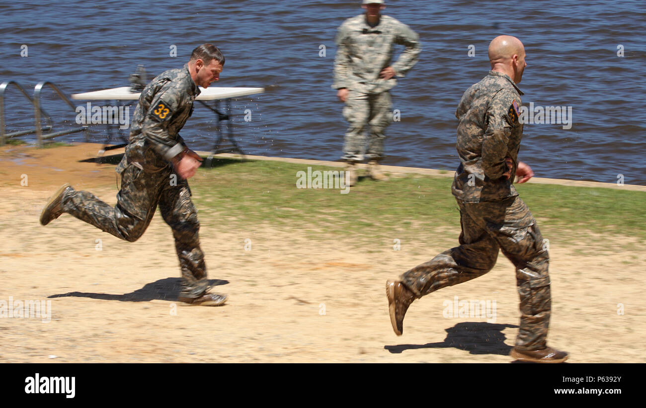 U.S. Army 1st Sgt. Joshua Rolfes (left) and Staff Sgt. Joshua Rolfes ...