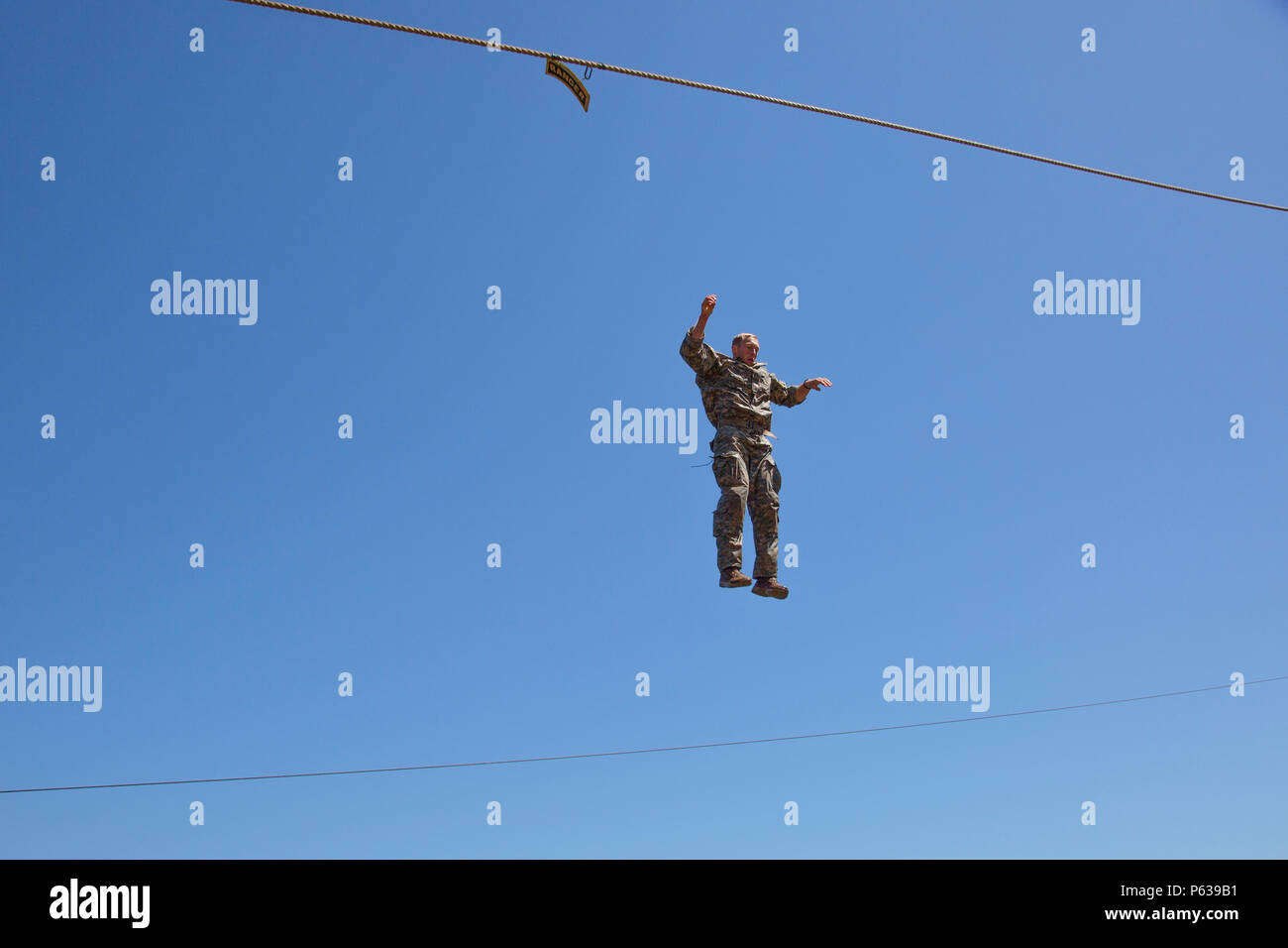 A U.S. Army Ranger jumps into Victory Pond during the Best Ranger ...