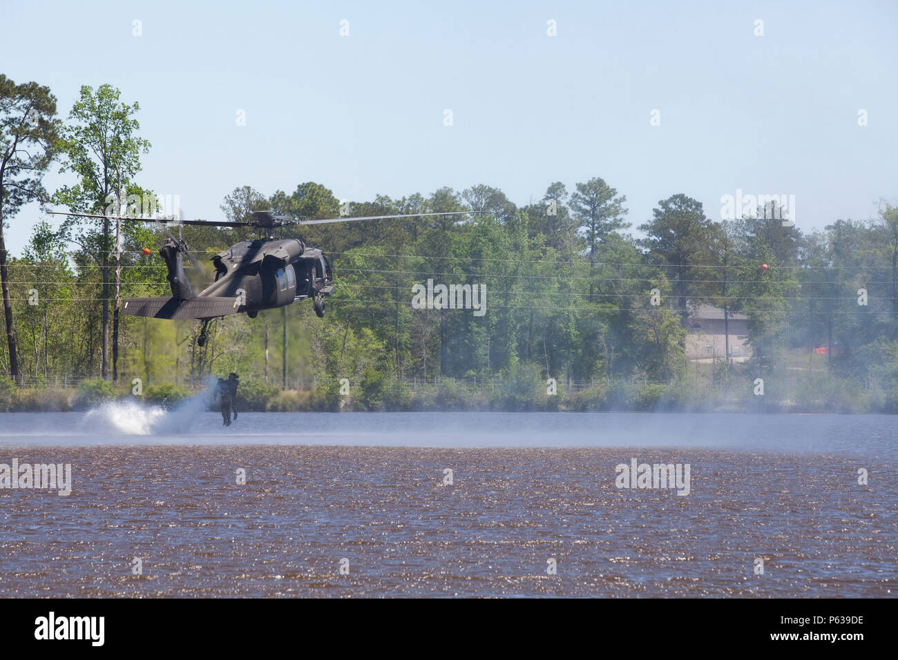 U.S. Army Rangers participate in helocast operations during the Best ...