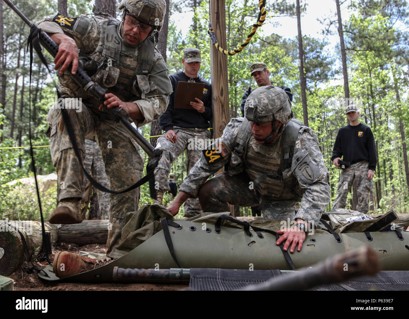 U.S. Army Capt. Riley Morris and Staff Sgt. Michael Roggero, assigned ...