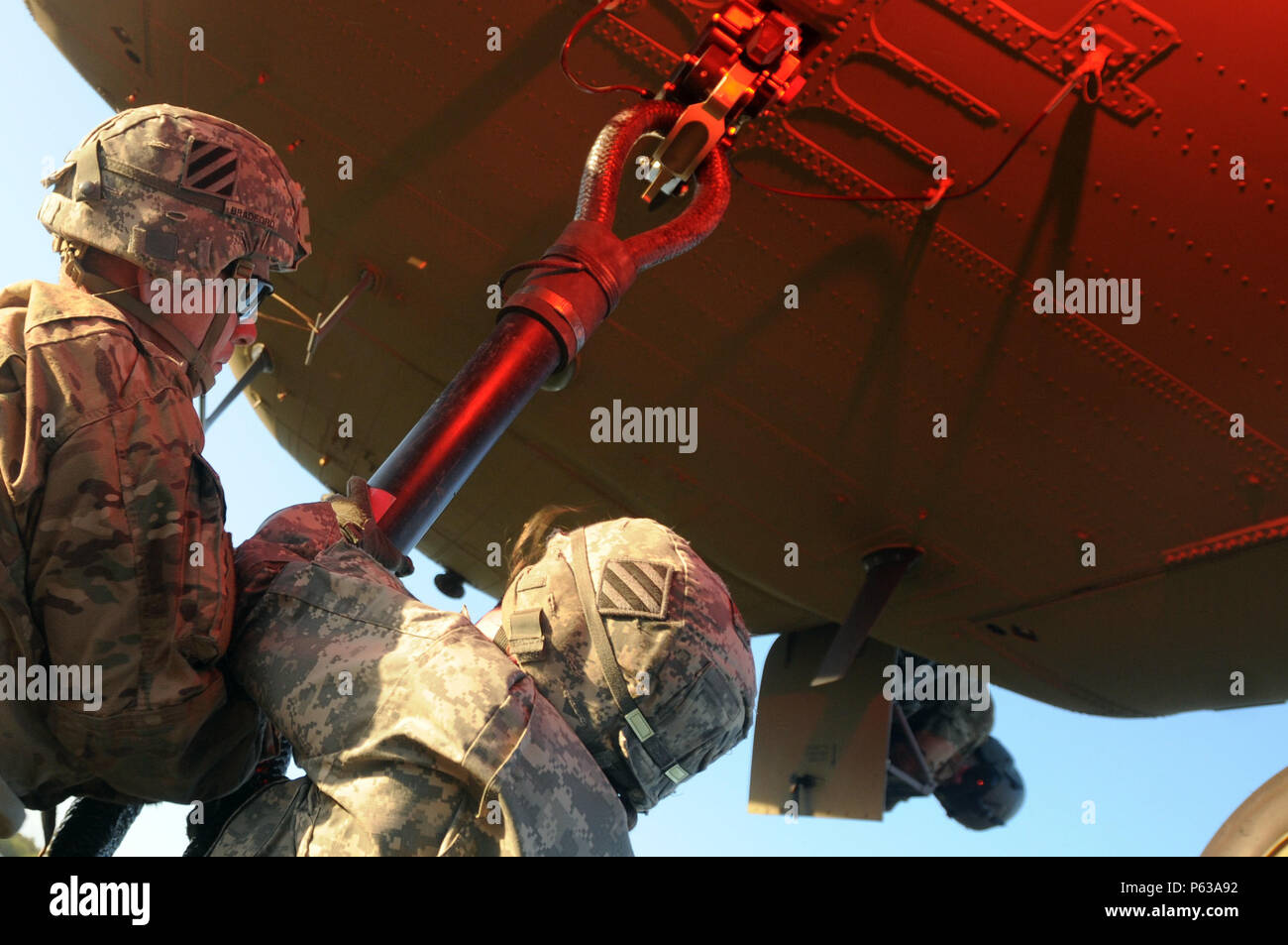 Chief Warrant Officer 2 Roger Bradford (left), Senior Airdrop Systems ...
