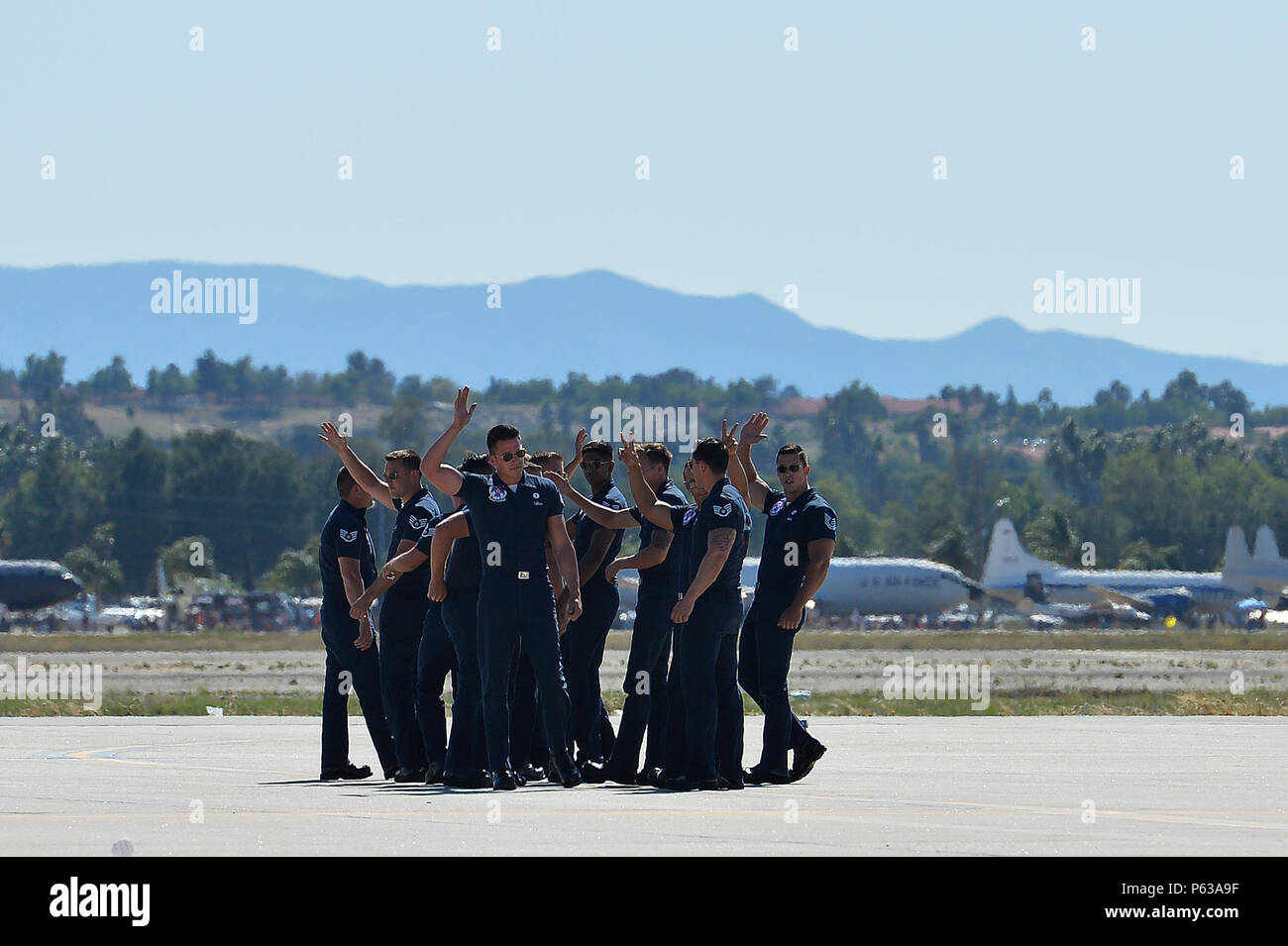Thunderbirds show line members wave to the crowd after the ground show ...