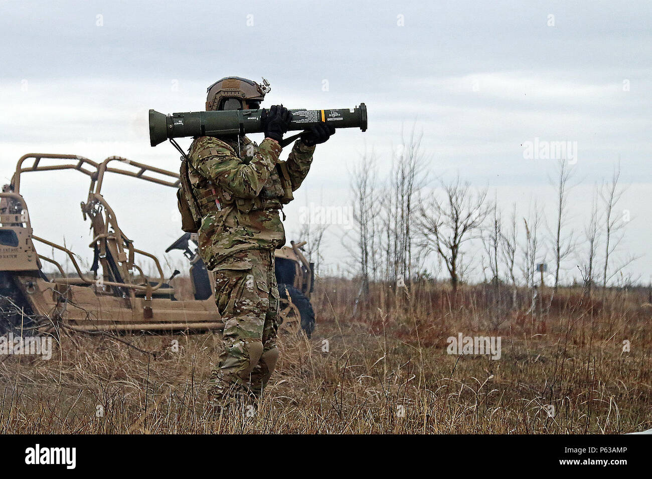 A Special Operations Command Forward Eastern Europe soldier prepares to ...