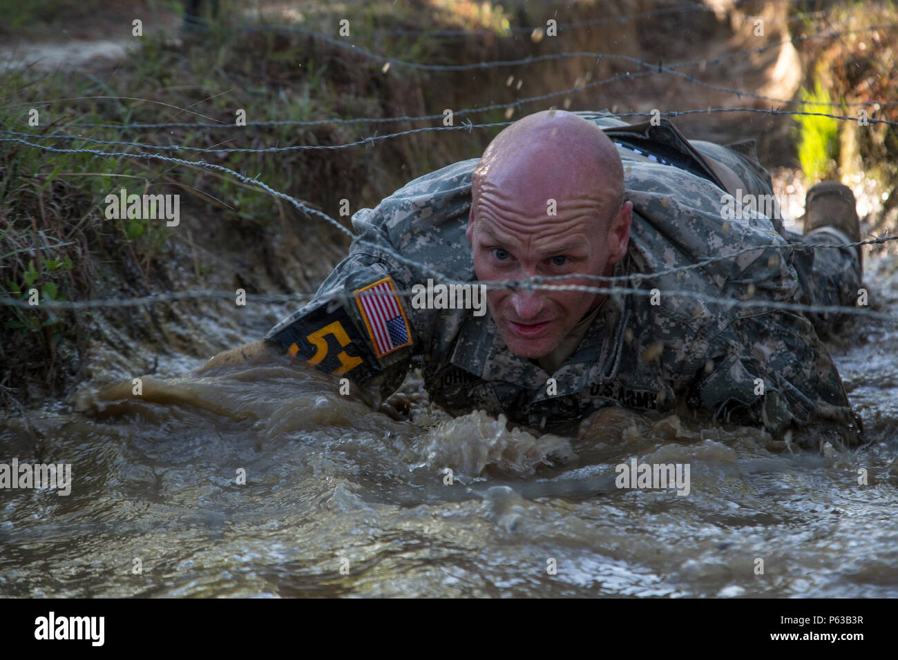 U.S. Army Sgt. First Class Corey Johnston, assigned to the 7th Special ...