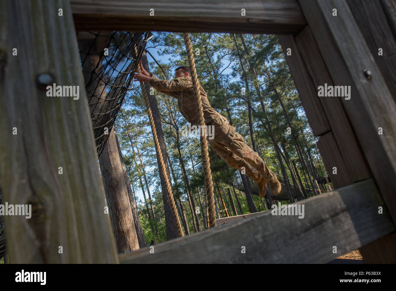 A U.S. Army Soldier begins an obstacle at DARBY QUEEN obstacle course ...