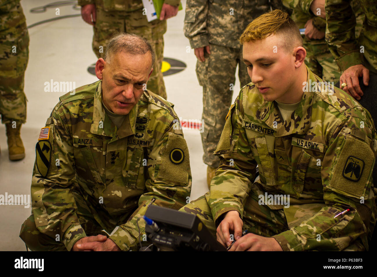 Lt. Gen. Stephen R. Lanza, I Corps commanding general, listens to U.S ...